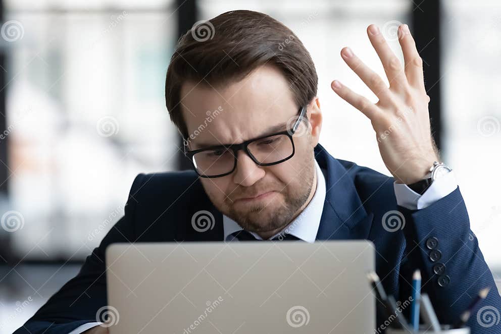 Stressed 30s Businessman Irritated by Bad Computer Work. Stock Image ...