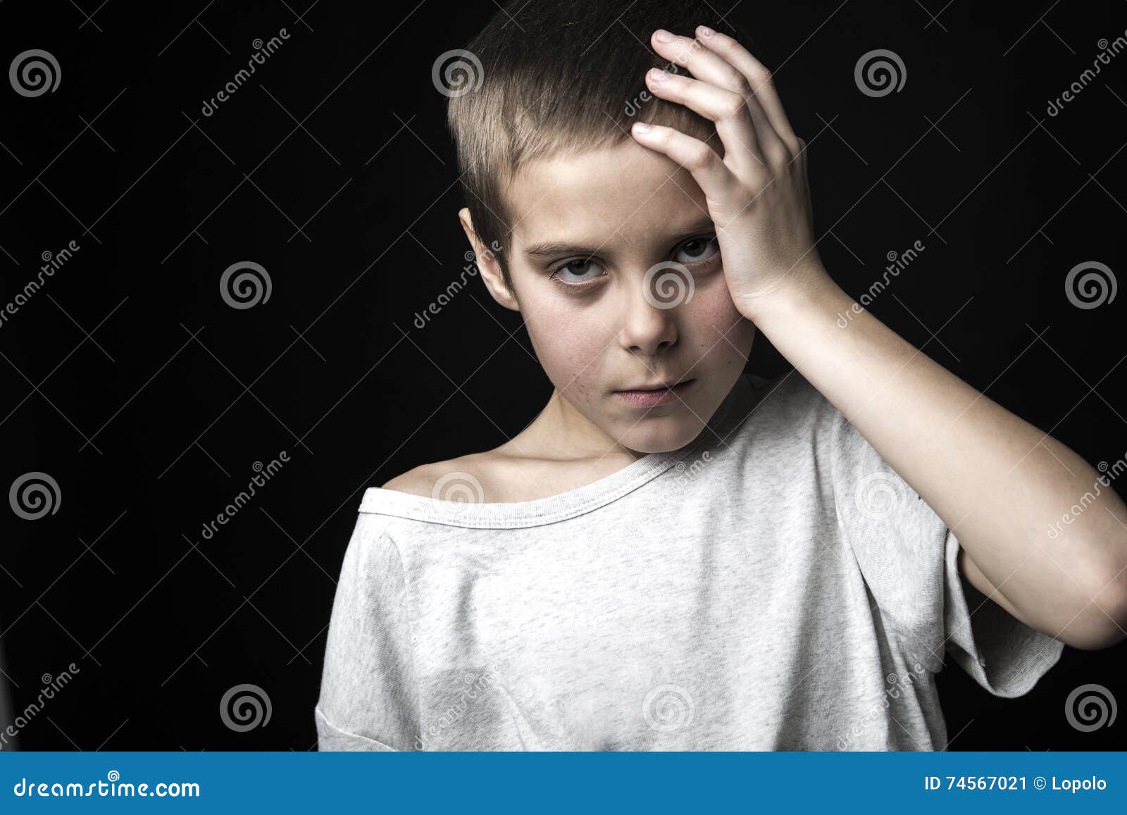 Stressed sad boy on studio stock image. Image of authentic - 74567021