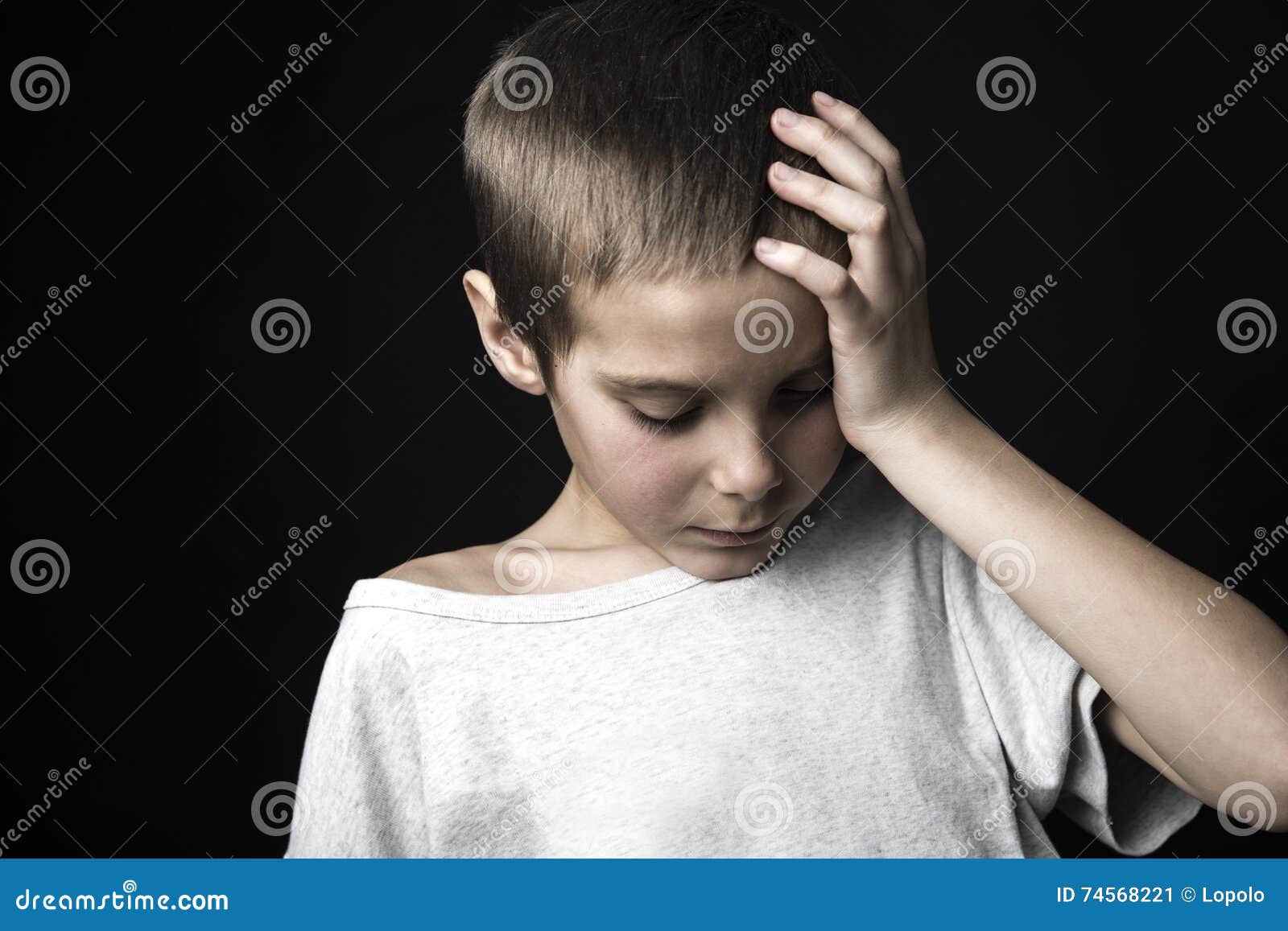 Stressed sad boy on studio stock image. Image of sadness - 74568221