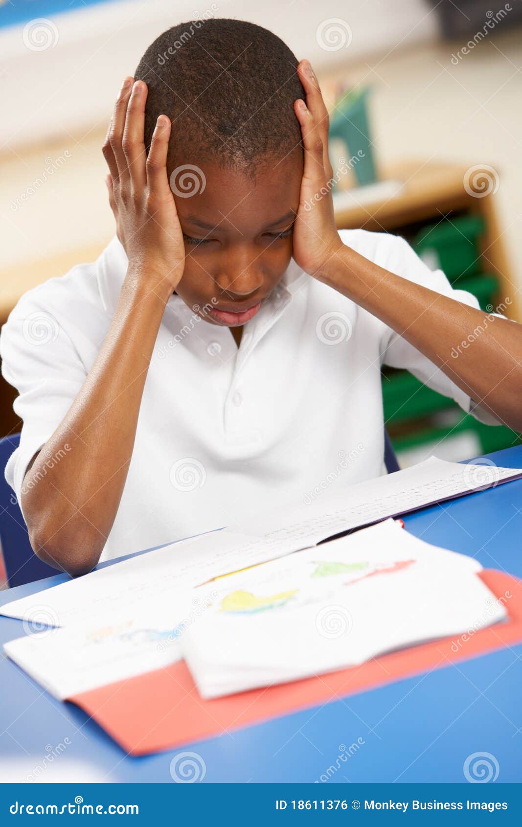 Stressed Schoolboy Studying In Classroom Royalty-Free Stock Image ... Stressed Schoolboy Studying In Classroom Royalty-Free Stock Image ...