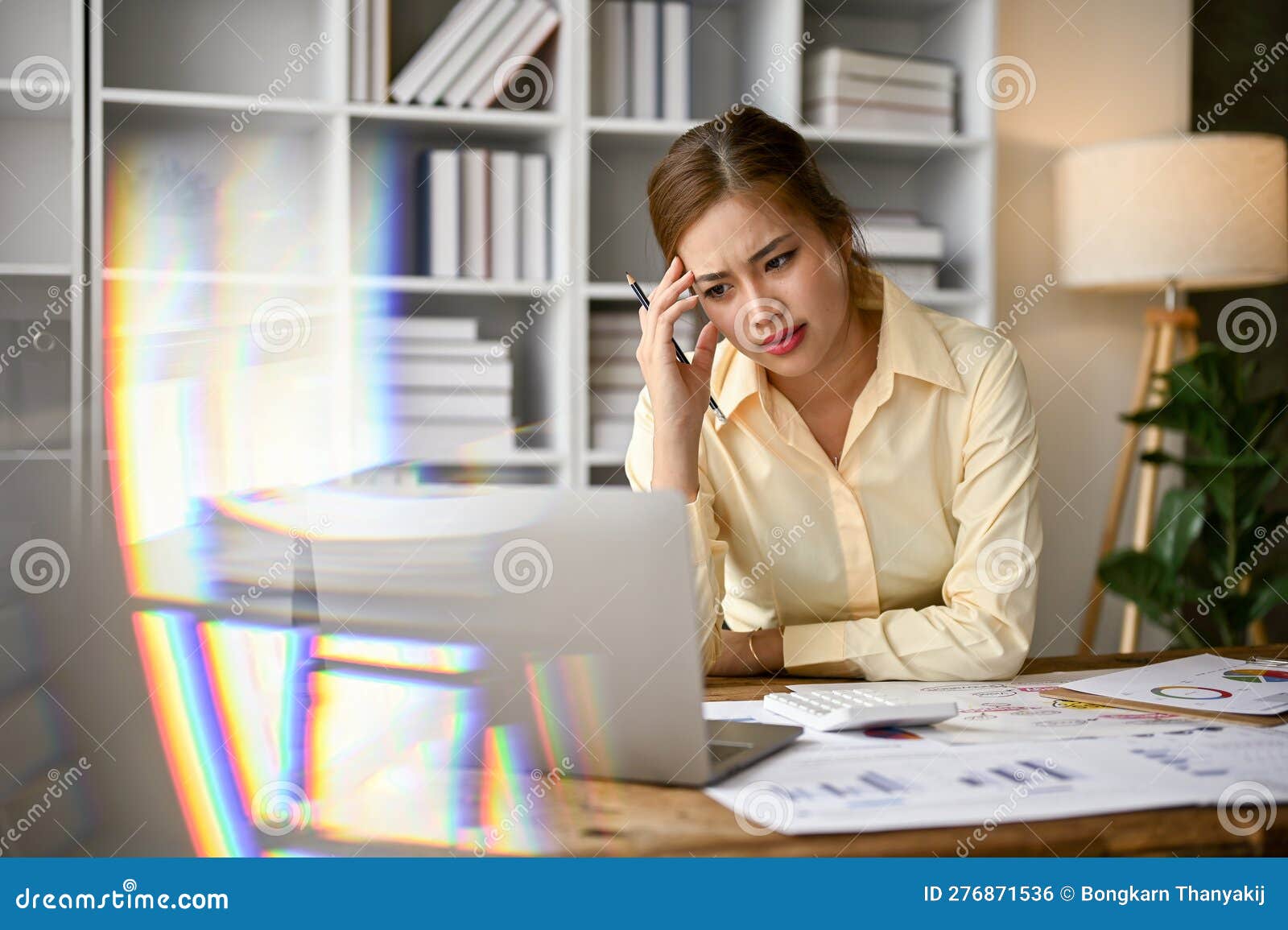 Stressed and Serious Young Asian Businesswoman Working on Her Project ...
