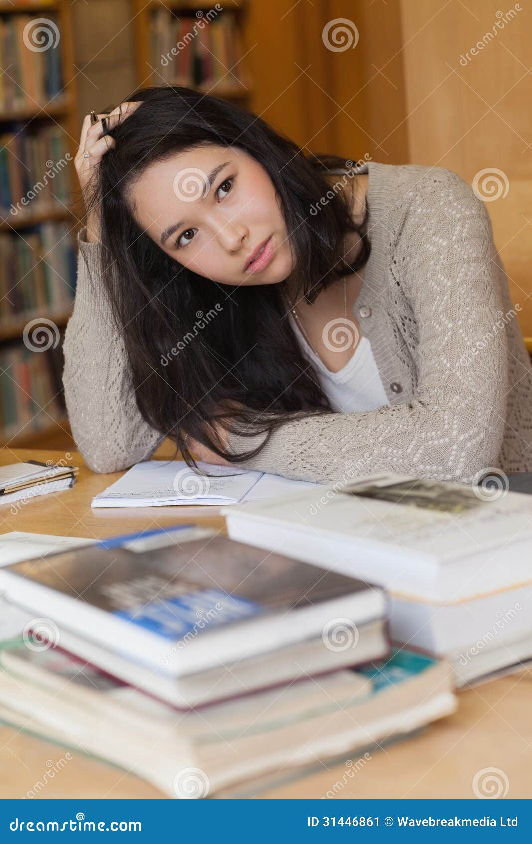Stressed Student in a Library Stock Image - Image of books, leaning ...