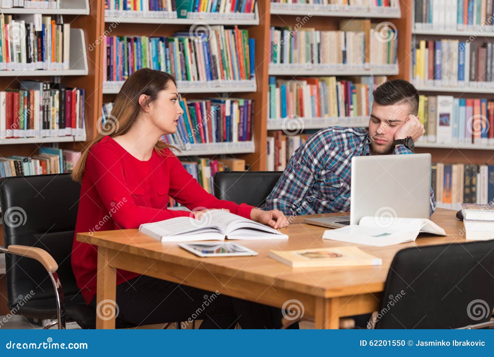 Stressed Students Doing Their Homework at the Desk Stock Photo - Image ...
