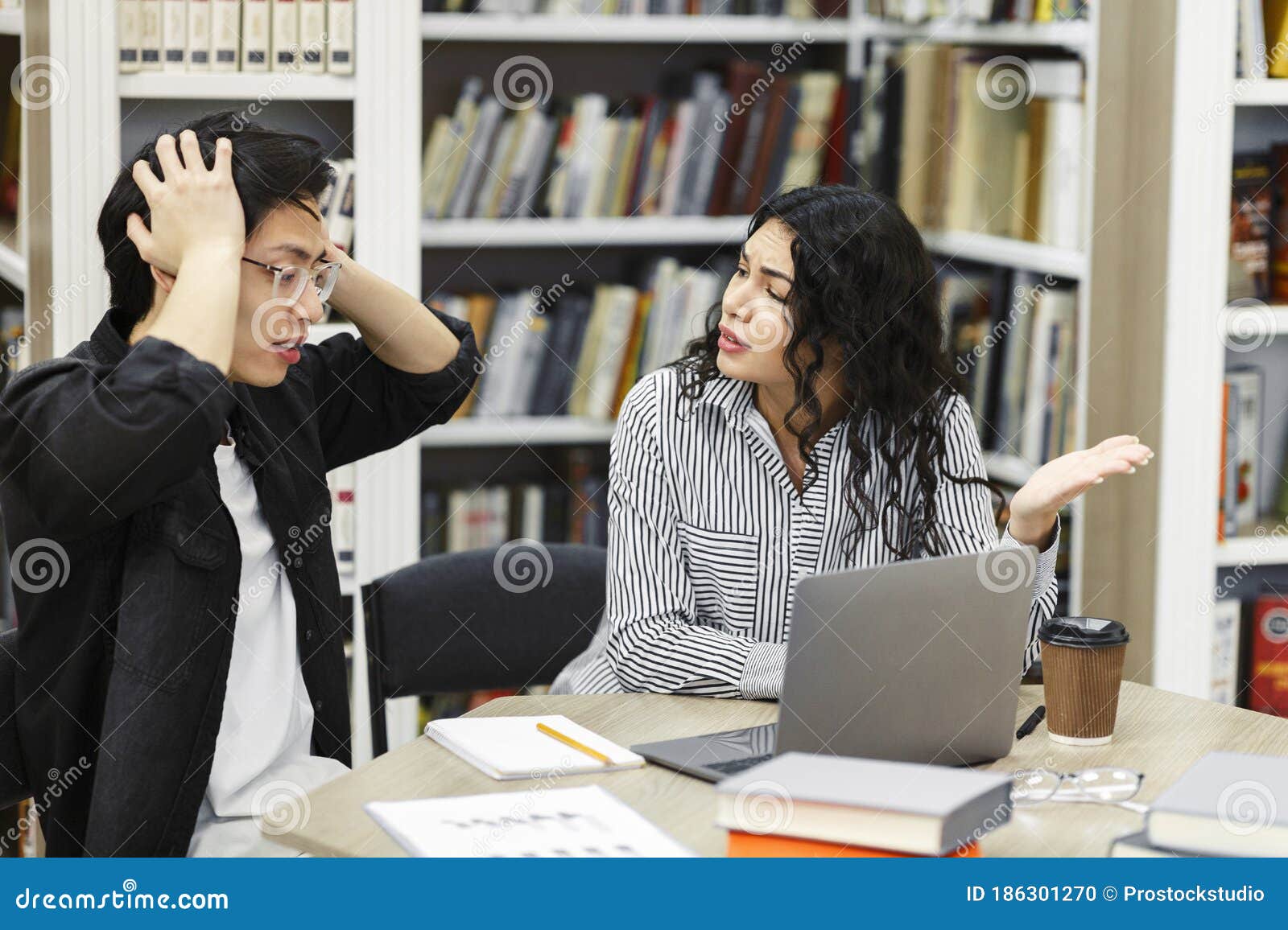 Stressed Students Preparing for Examination in Campus Library Stock ...