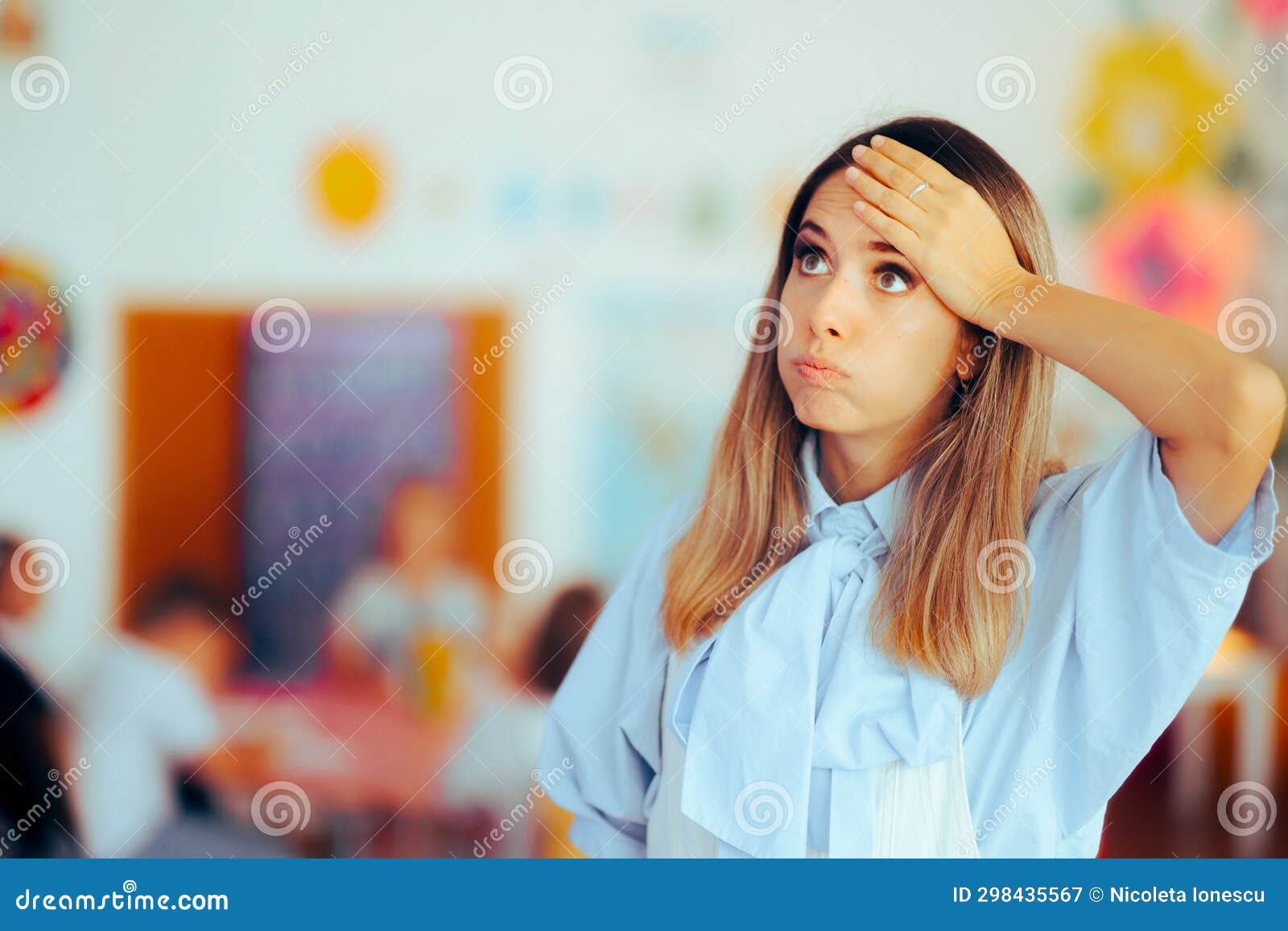 Stressed Teacher Feeling Overwhelmed in a Classroom Stock Image - Image ...