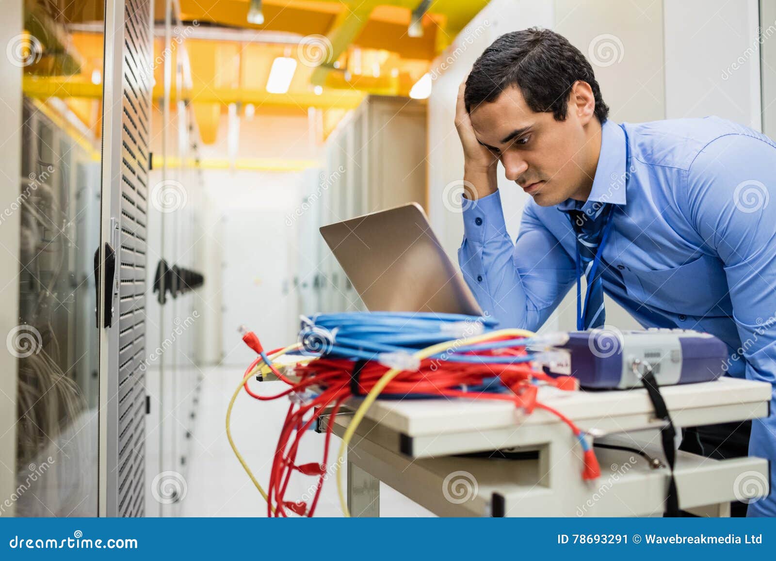 Stressed Technician Using Laptop Stock Image - Image of center, indoors ...