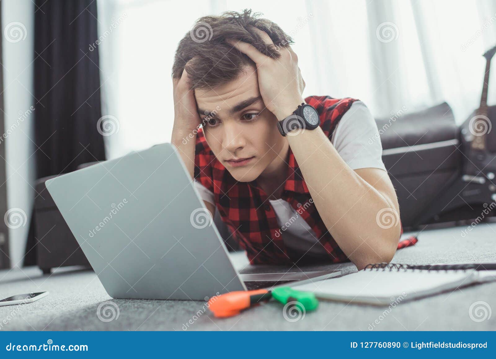 Stressed Teen Boy Studying with Laptop while Lying Stock Photo - Image ...