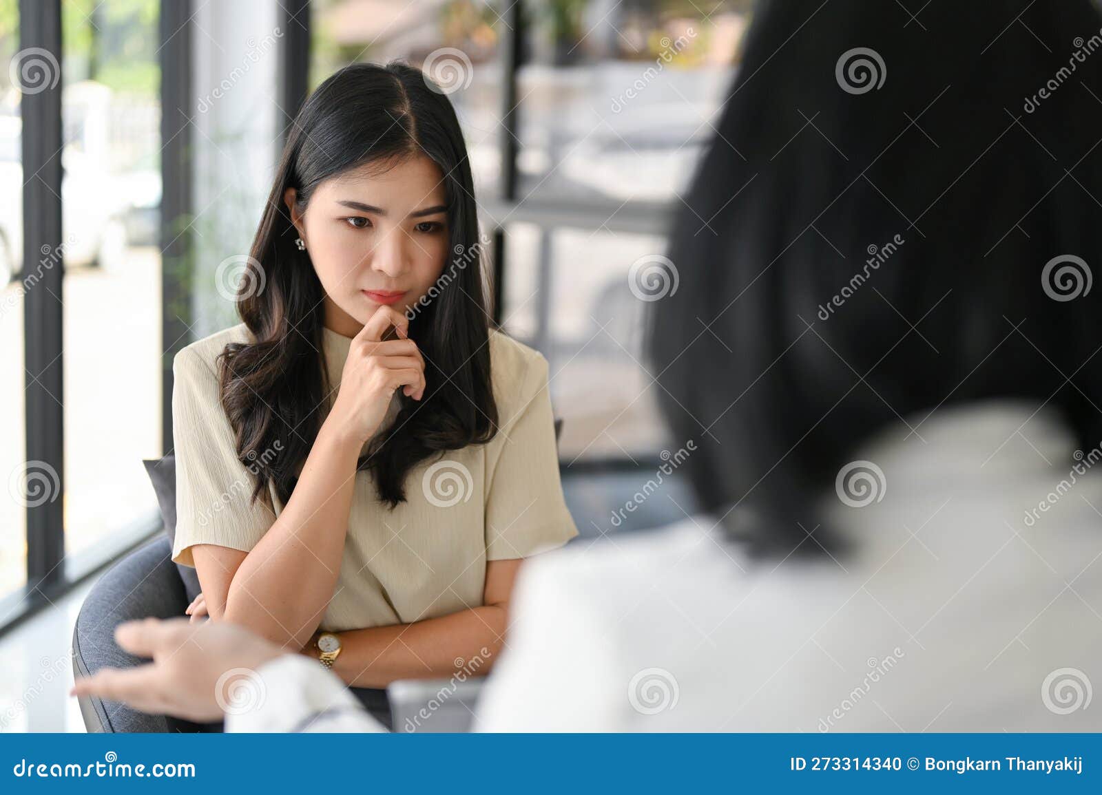 Thoughtful Asian Woman Having a Serious Talk with Her Personal ...