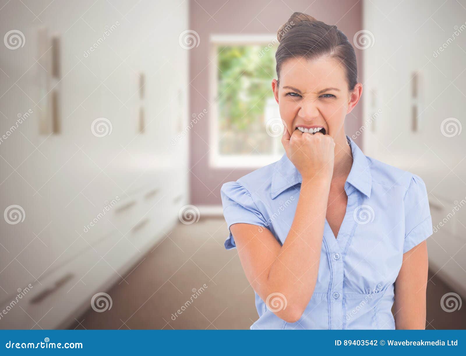 Stressed Woman Biting Hand in Room Stock Photo - Image of classy ...