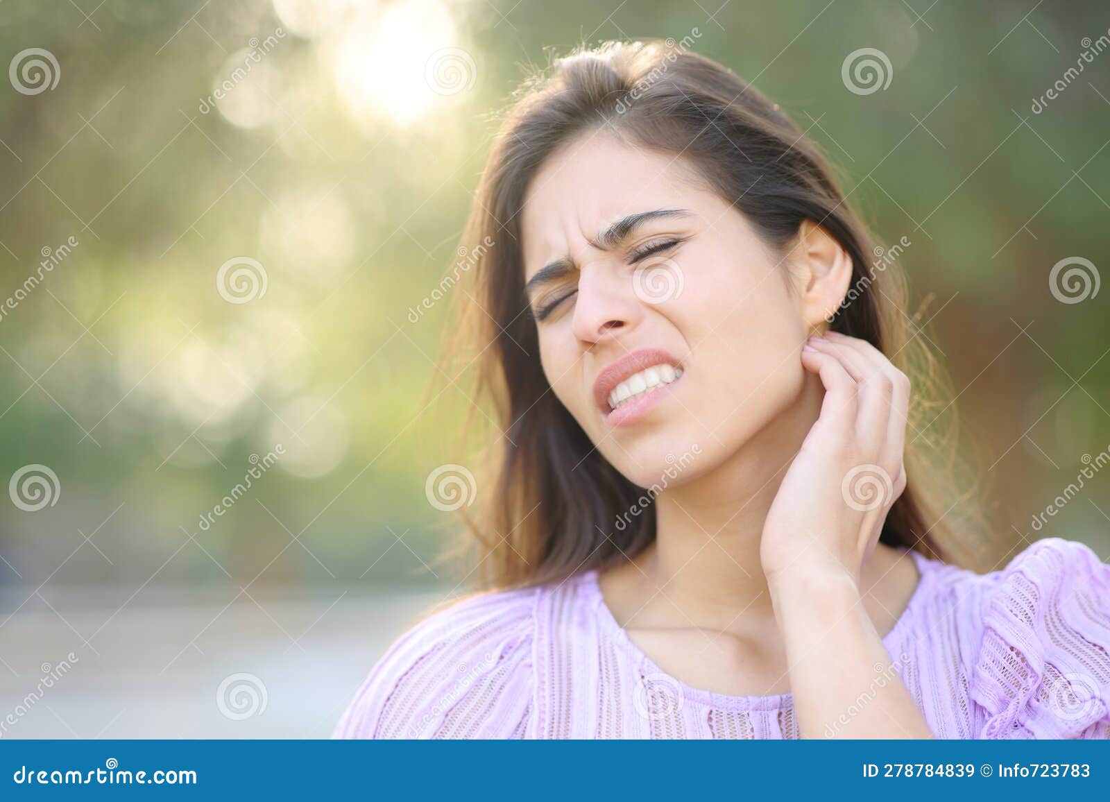 Stressed Woman Scratching Neck in a Park Stock Image - Image of hand ...