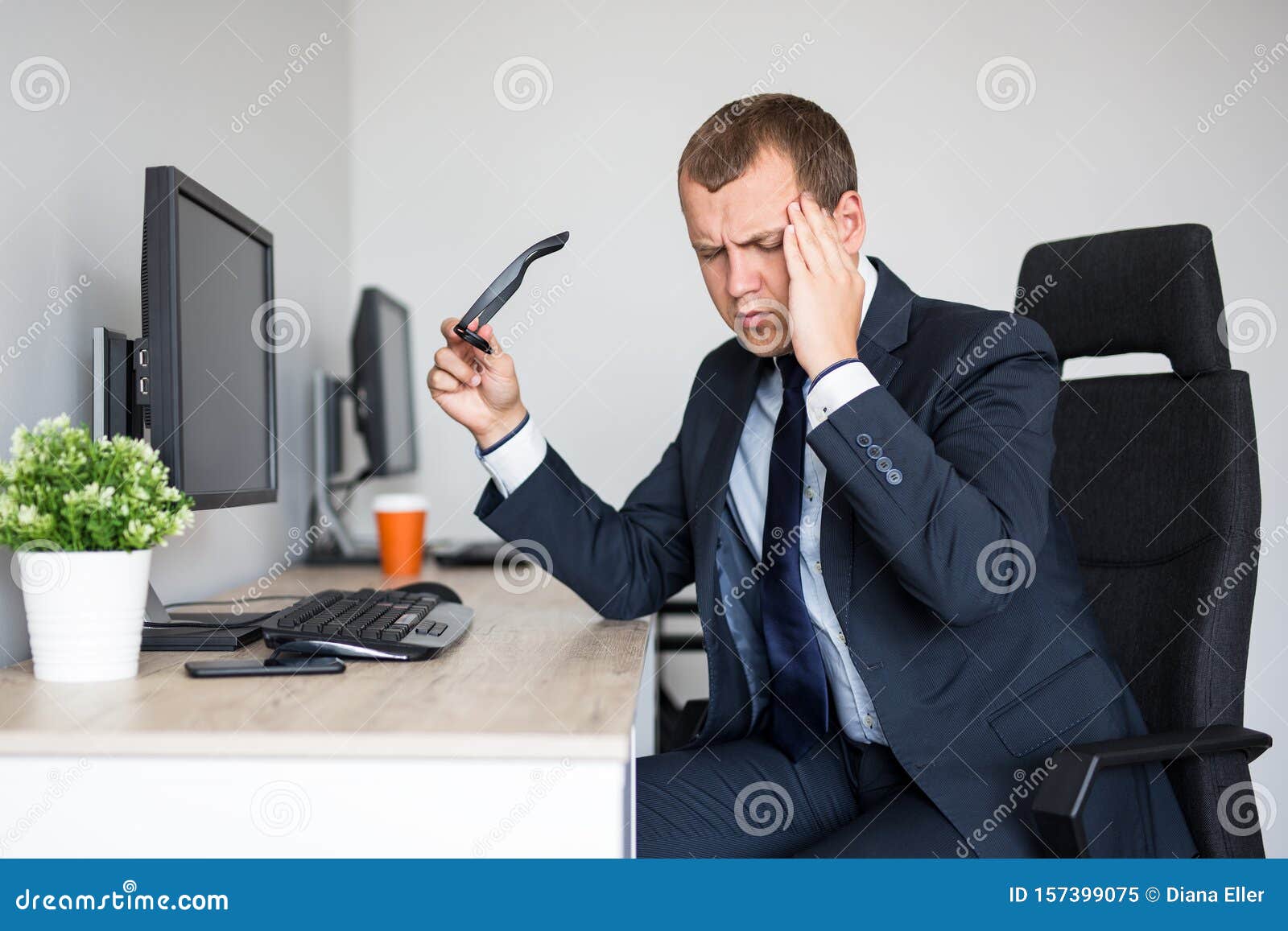 Stressed Young Business Man with Headache Working in Office Stock Image ...