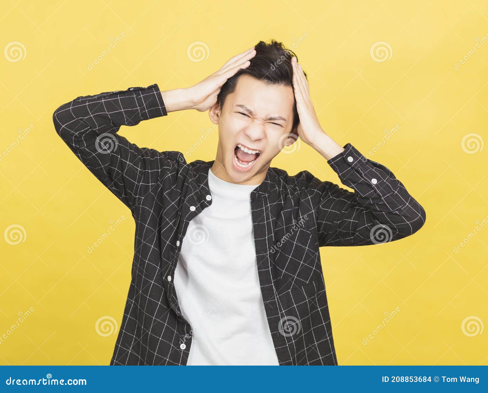 Stressed Young Man with Headache and Screaming Stock Photo - Image of ...