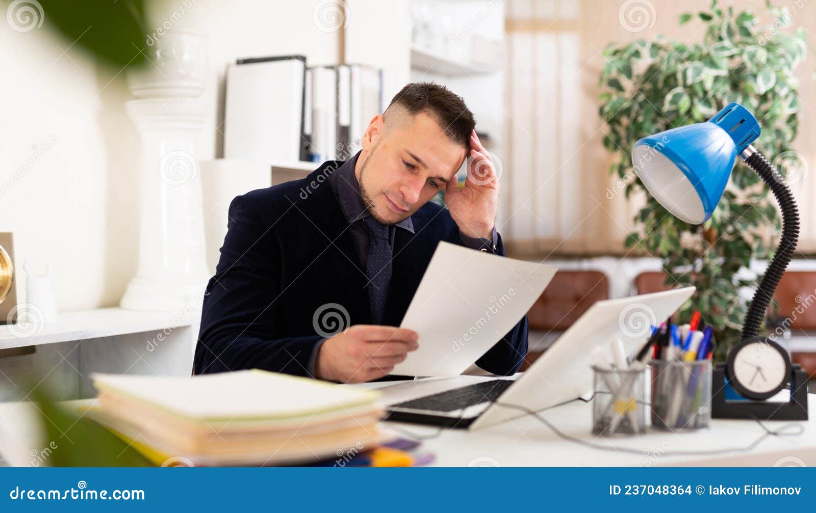 Stressed Young Man Working in Office Stock Photo - Image of french ...