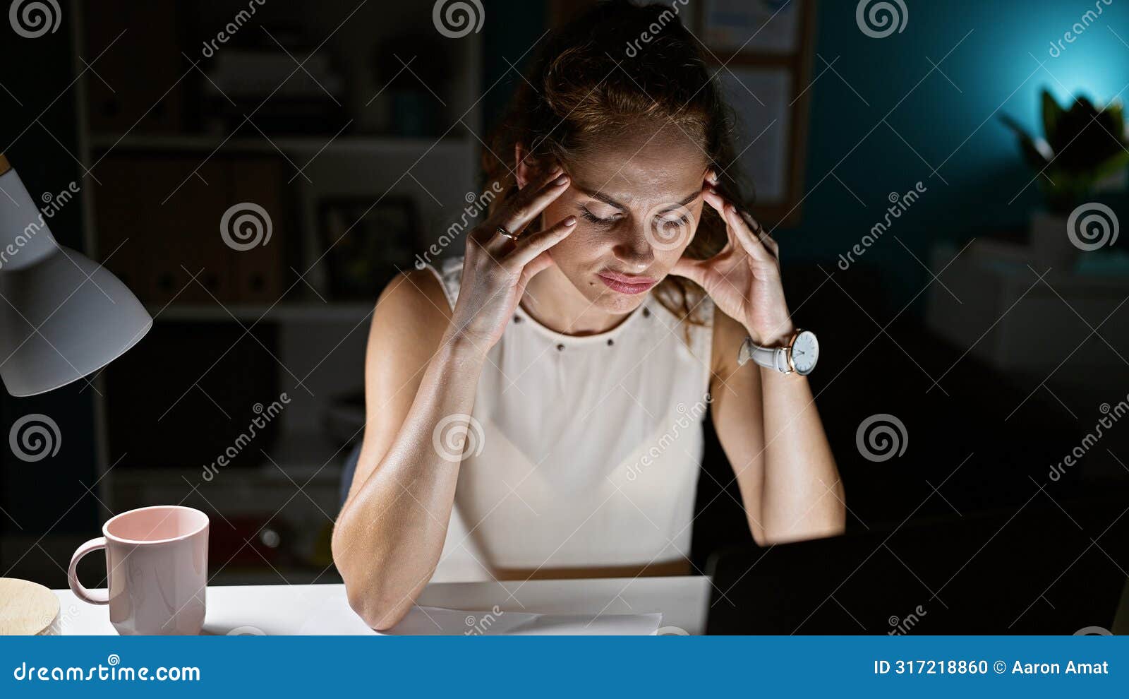 Stressed Young Woman with Headache Working Late in Office, in Front of ...