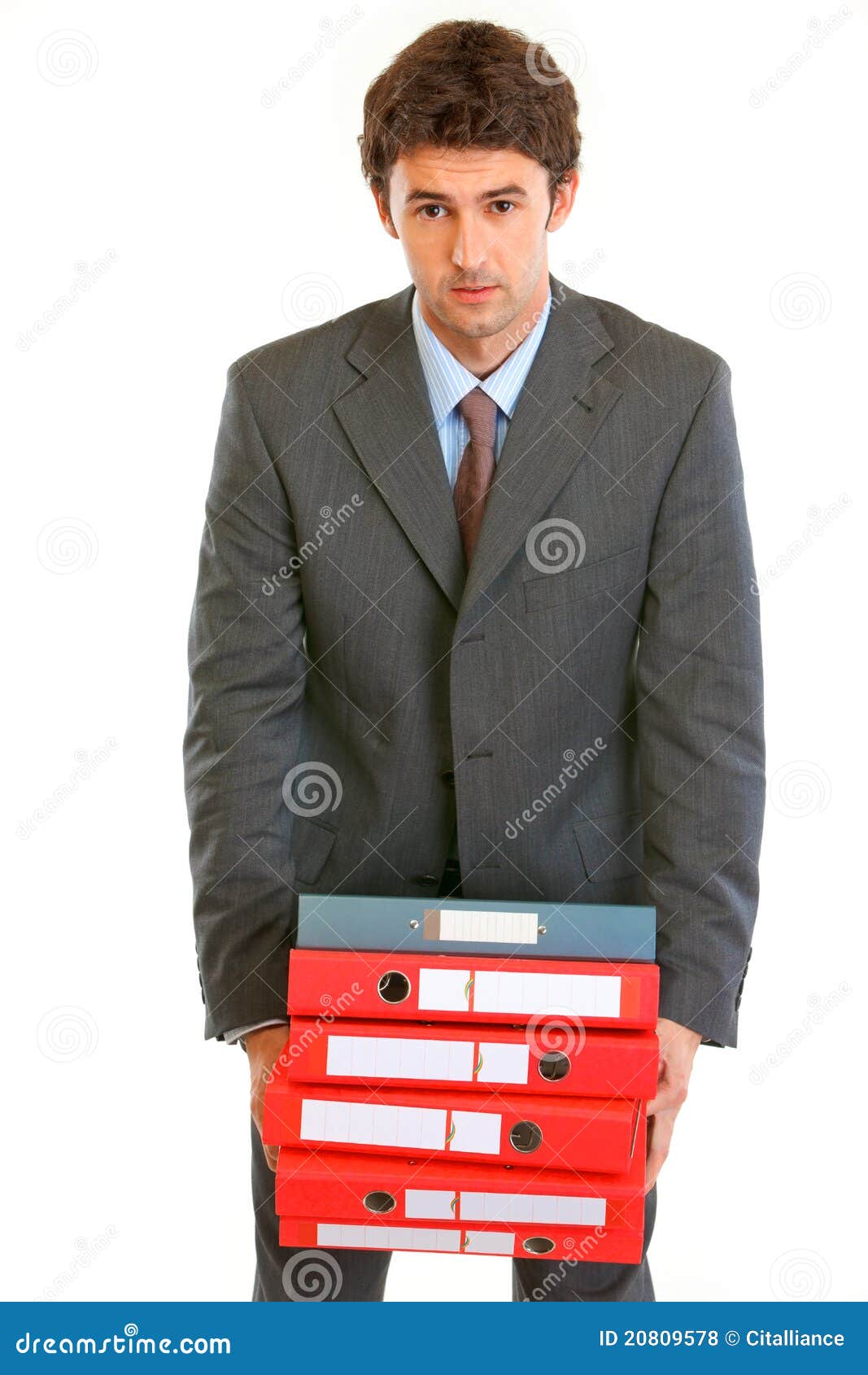 Stressful Businessman Holding Heavy Folders Stock Photo - Image of ...