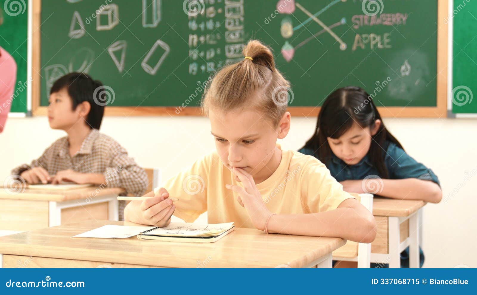Stressful Student Focus on Doing Test while Sitting in Front of Board ...