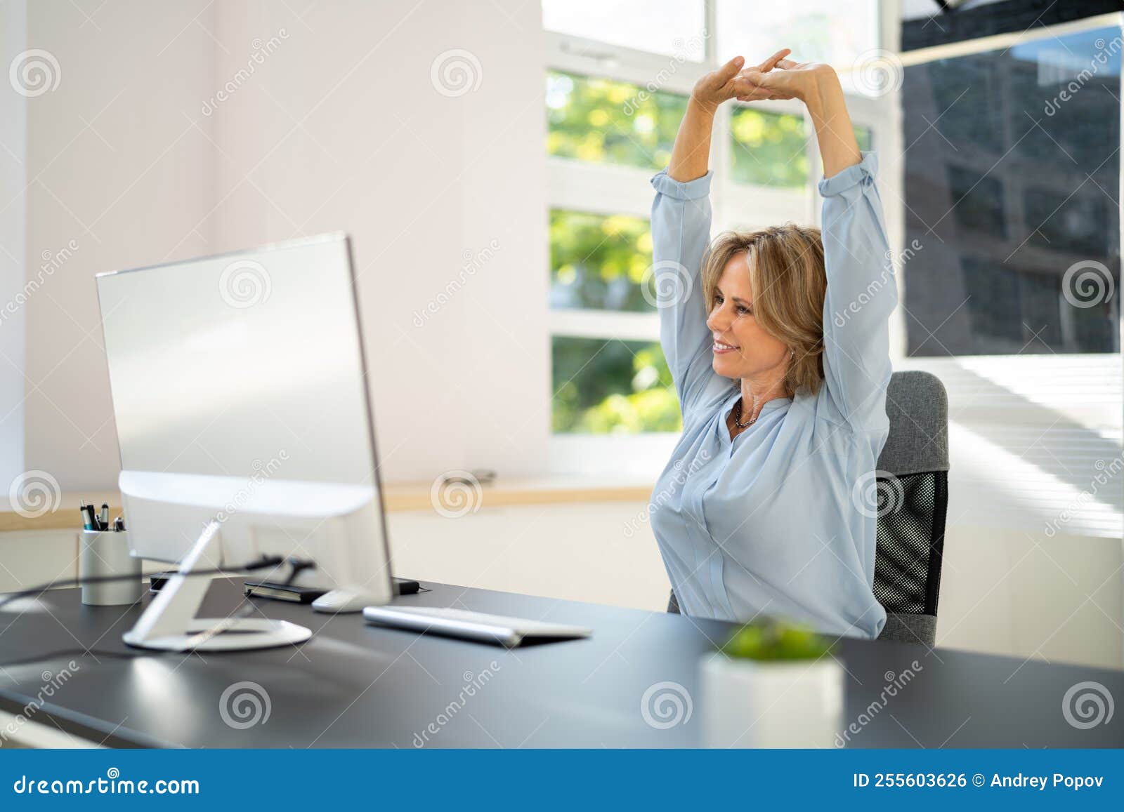 Stretch Arm Exercises while Working Stock Photo - Image of business ...