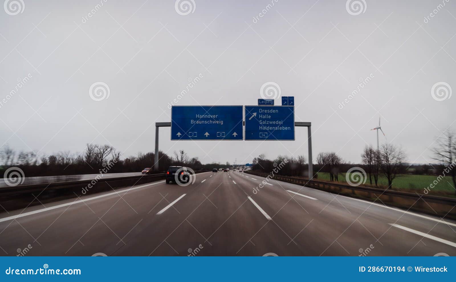 Stretch of an Empty Interstate Highway with Signs on Either Side of the ...