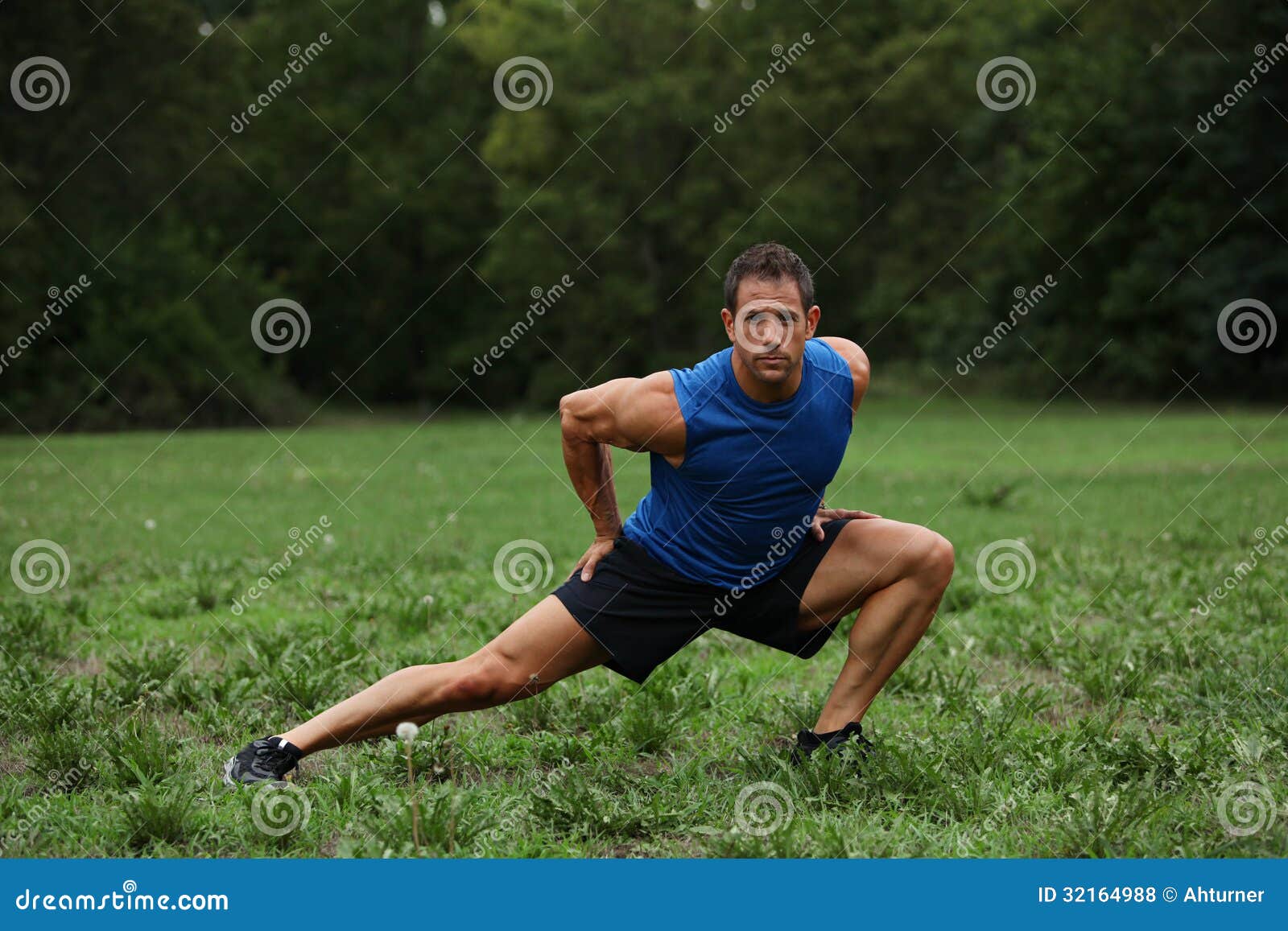 Stretch on the Playing Field Stock Photo - Image of lawn, training ...