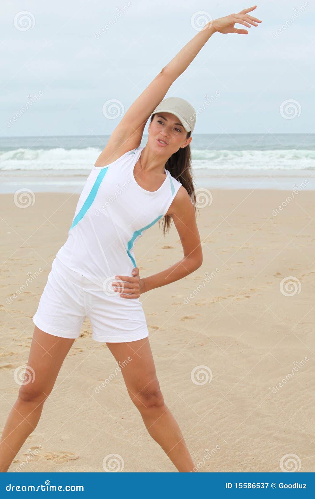 Stretching by the beach stock image. Image of health - 15586537