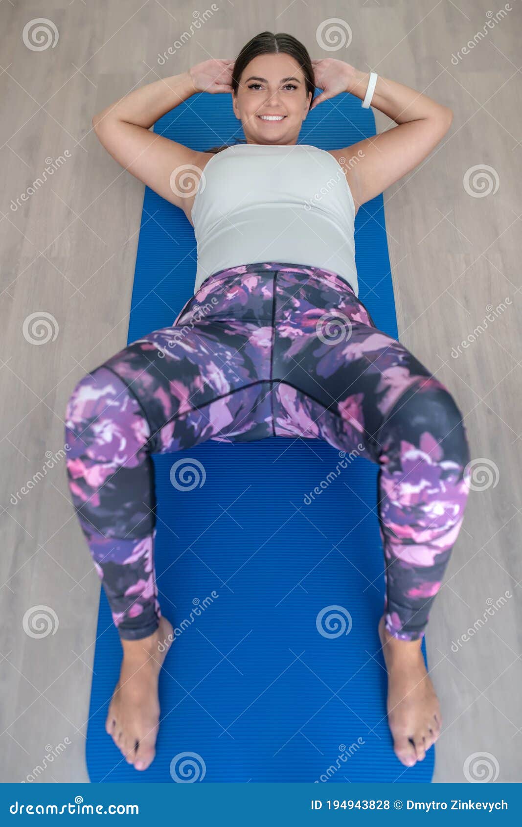 Woman Stretching Her Hamstrings while Doing Exercises Stock Photo ...