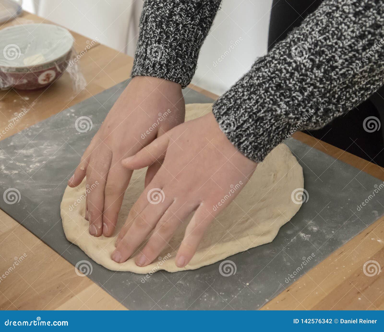 Stretching dough for pizza stock photo. Image of restaurant - 142576342