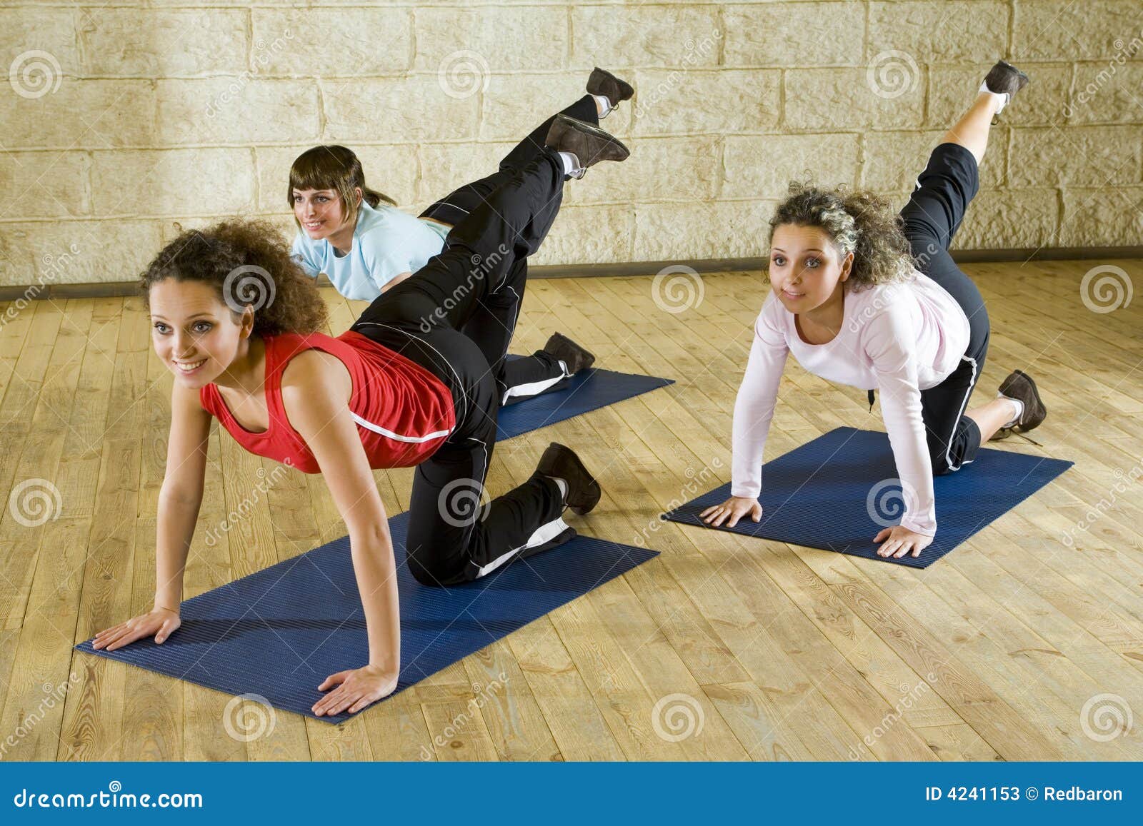 Stretching exercise on mat stock image. Image of smiling - 4241153