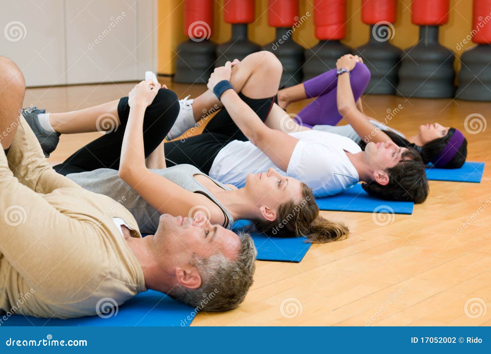 Stretching Exercises at Gym Stock Photo - Image of people, energy: 17052002