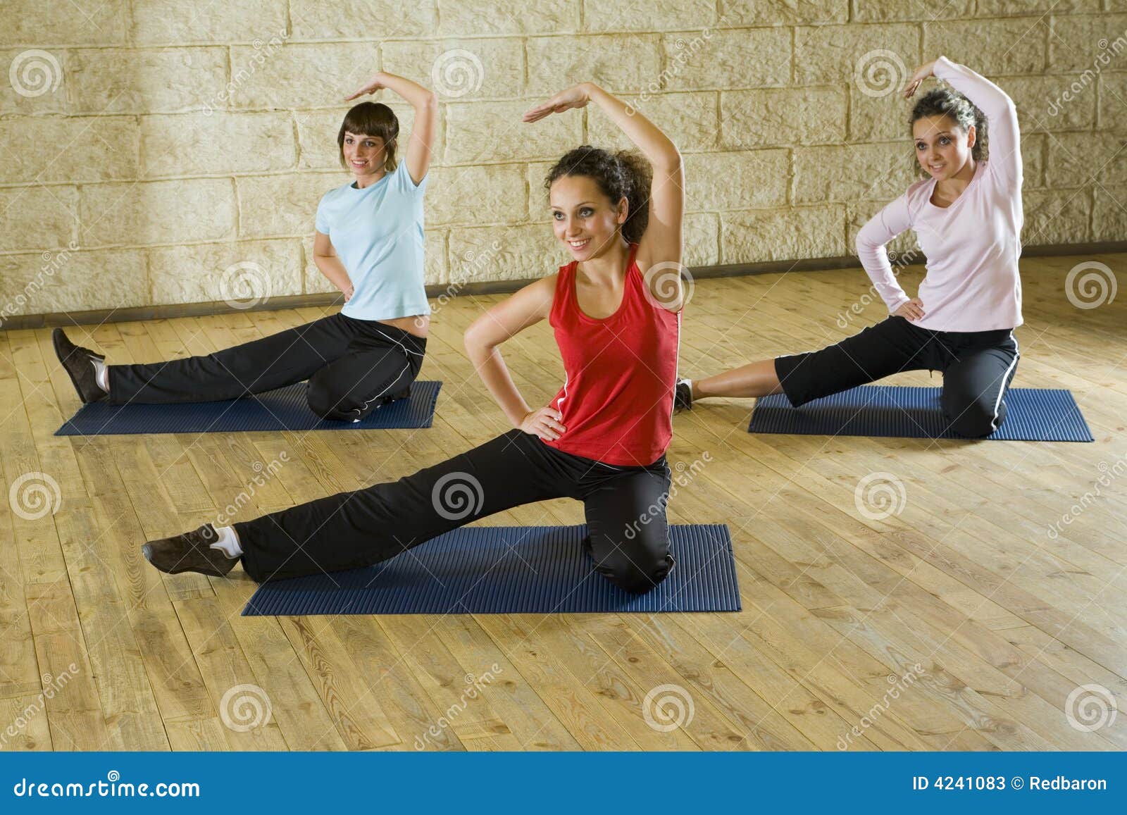 Stretching Exercises on Yoga Mat Stock Image - Image of effort ...