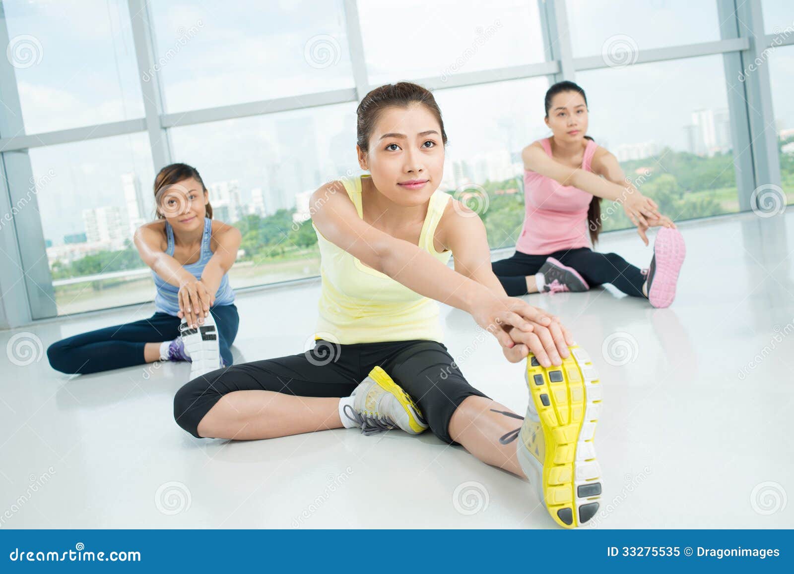 Stretching exercises stock image. Image of exercises - 33275535