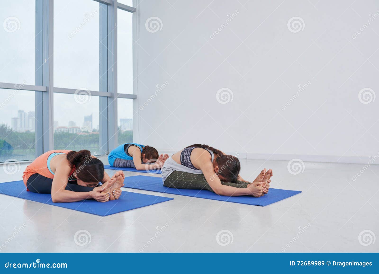 Stretching hamstrings stock image. Image of floor, women - 72689989