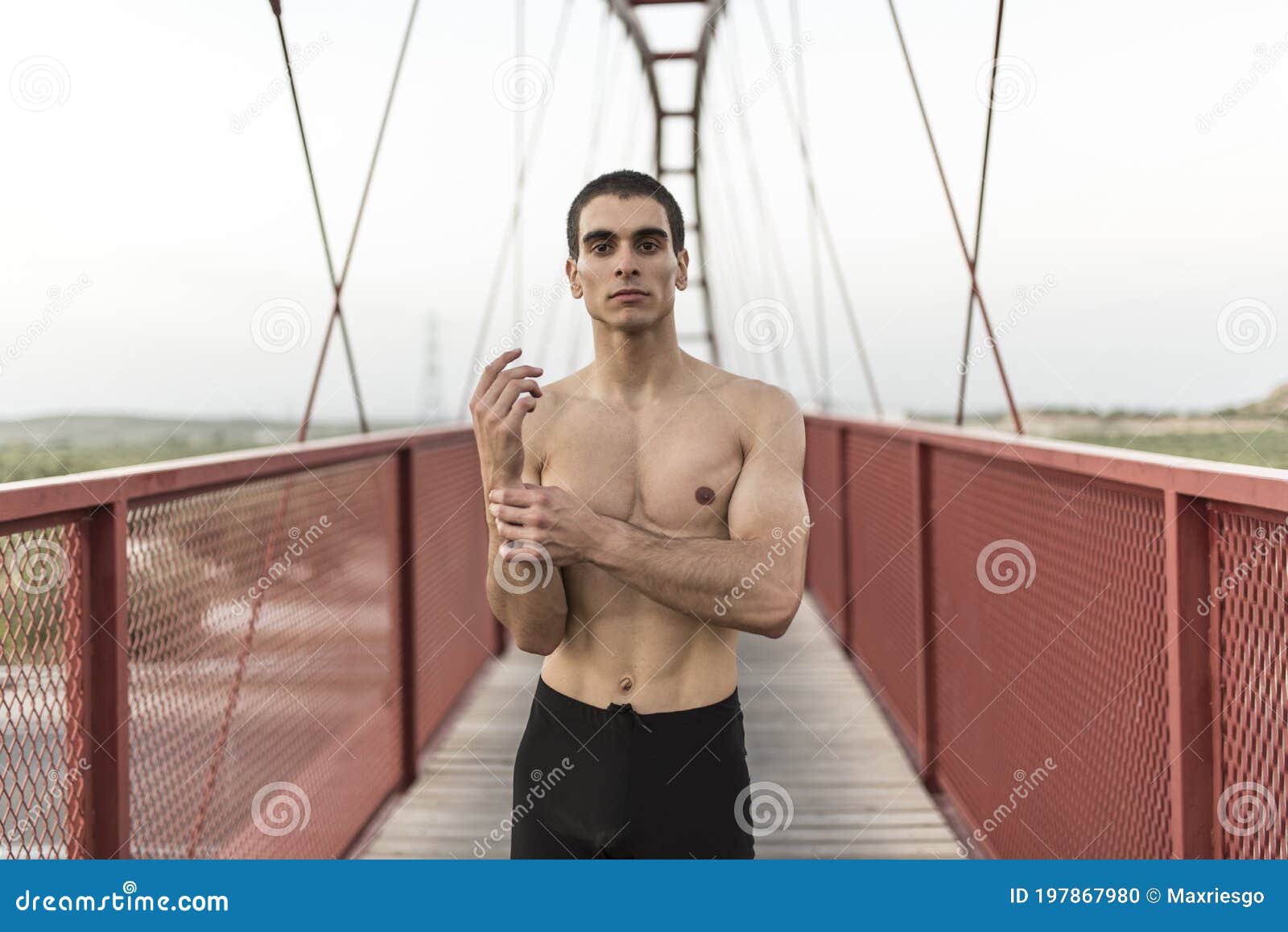 Stretching Man on Pedestrian Bridge Portrait Stock Photo - Image of ...
