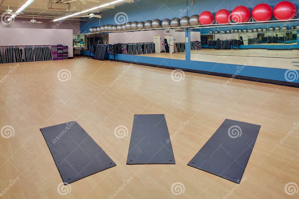 Stretching Mats and Exercise Balls in Gym Stock Image - Image of strong ...
