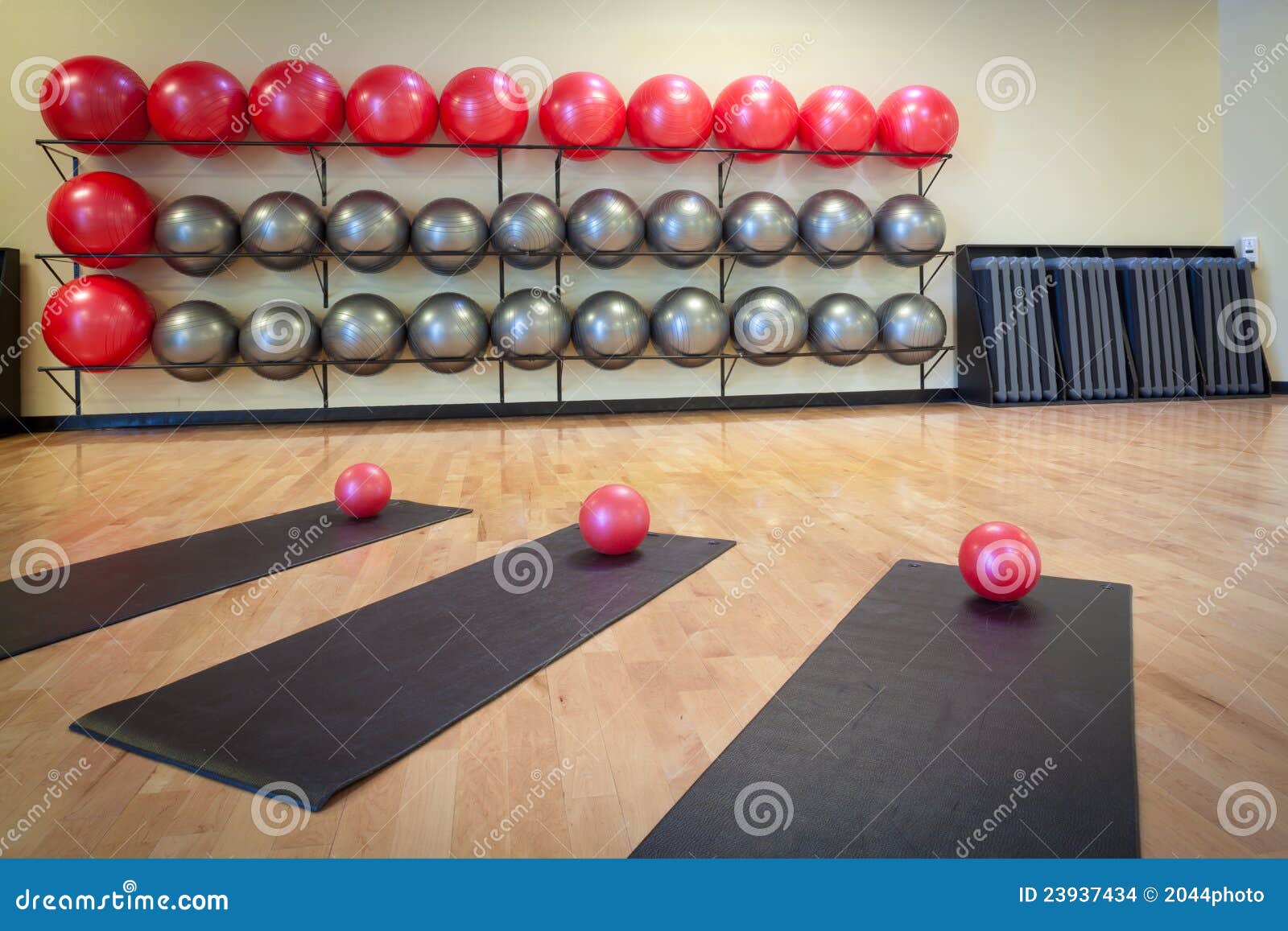 Stretching Mats and Exercise Balls in Gym Stock Photo - Image of club ...