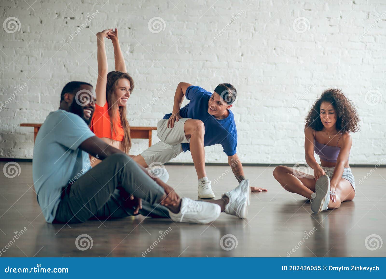 Group of Professional Dancers Doing Stretching Exercises Stock Image ...