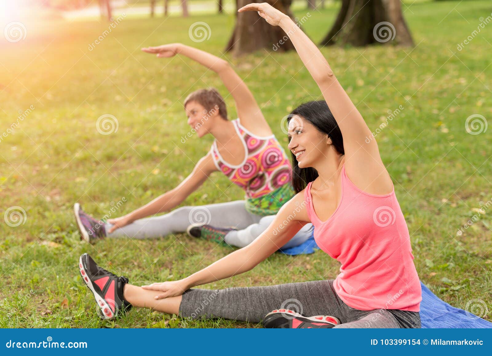 Stretching in Nature stock photo. Image of nature, smiling - 103399154