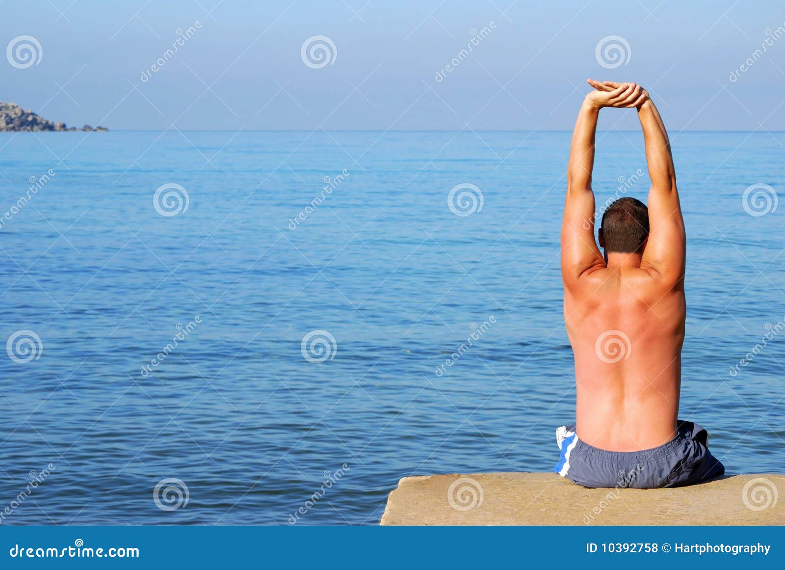 Stretching by the sea stock photo. Image of caucasian - 10392758