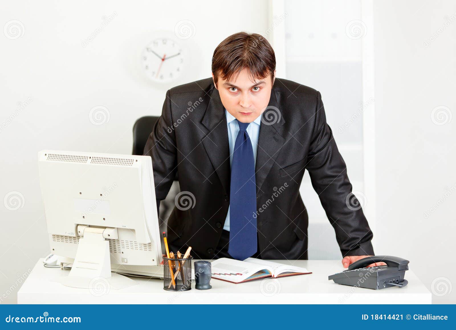 Strict Businessman Standing at Office Desk Stock Image - Image of ...