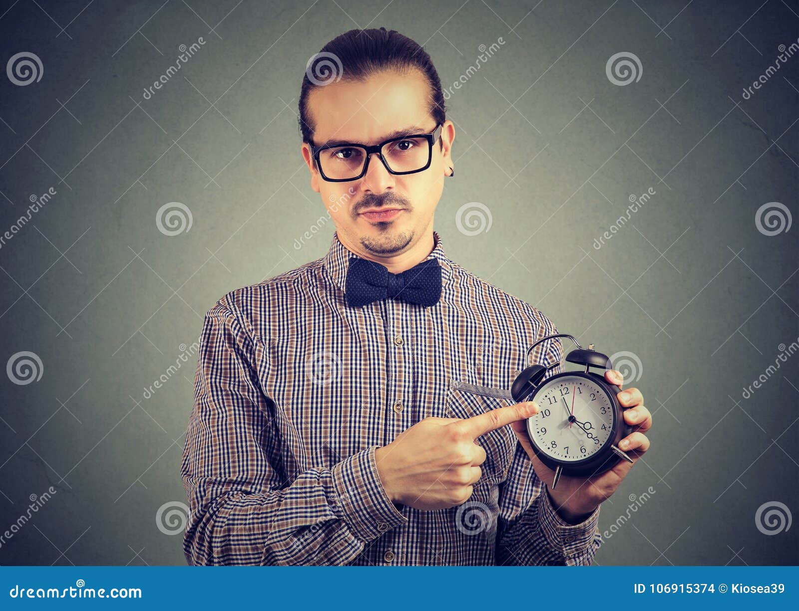 Strict Man Pointing at Clock Stock Photo - Image of employee, confident ...