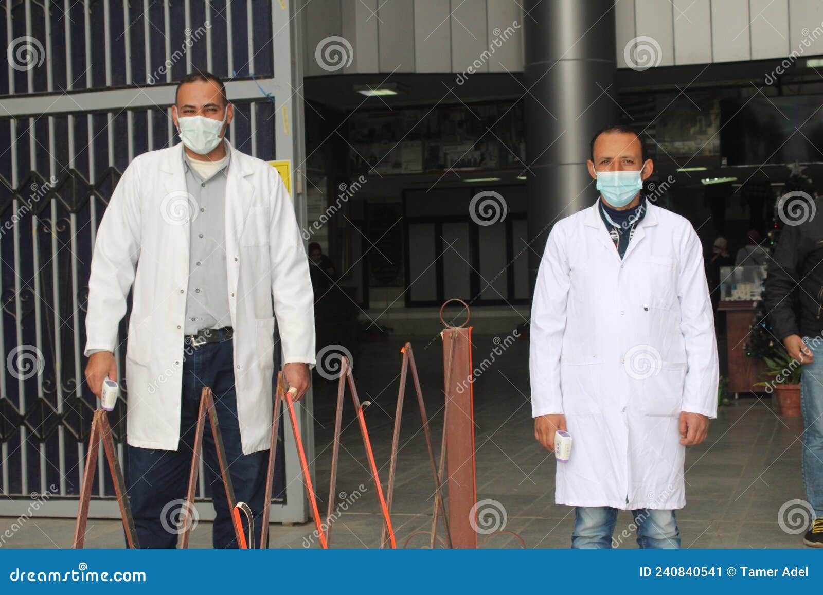 Strict Precautionary Measures before a Building Entry, Temperature ...