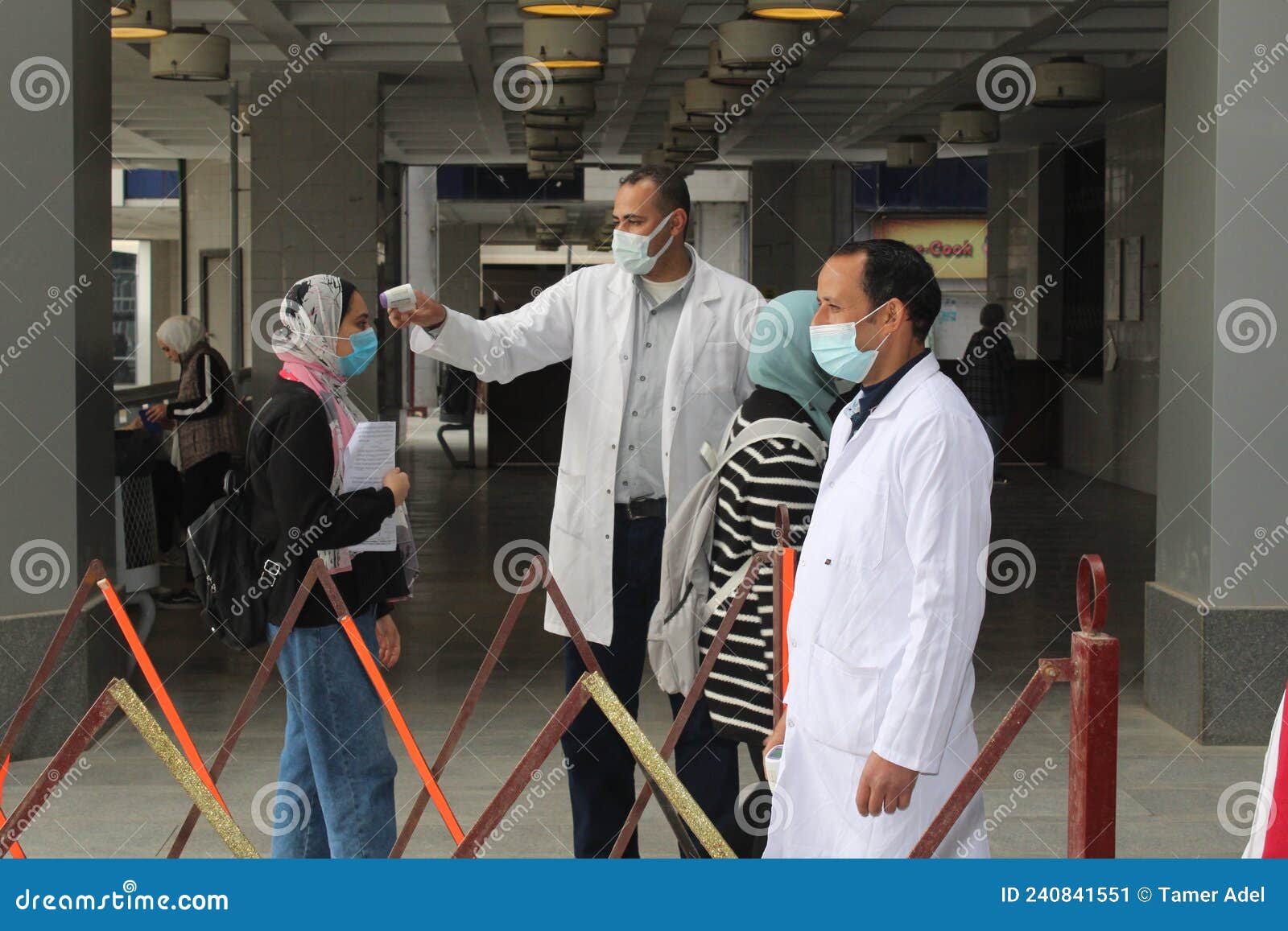 Strict Precautionary Measures before a Building Entry, Temperature ...