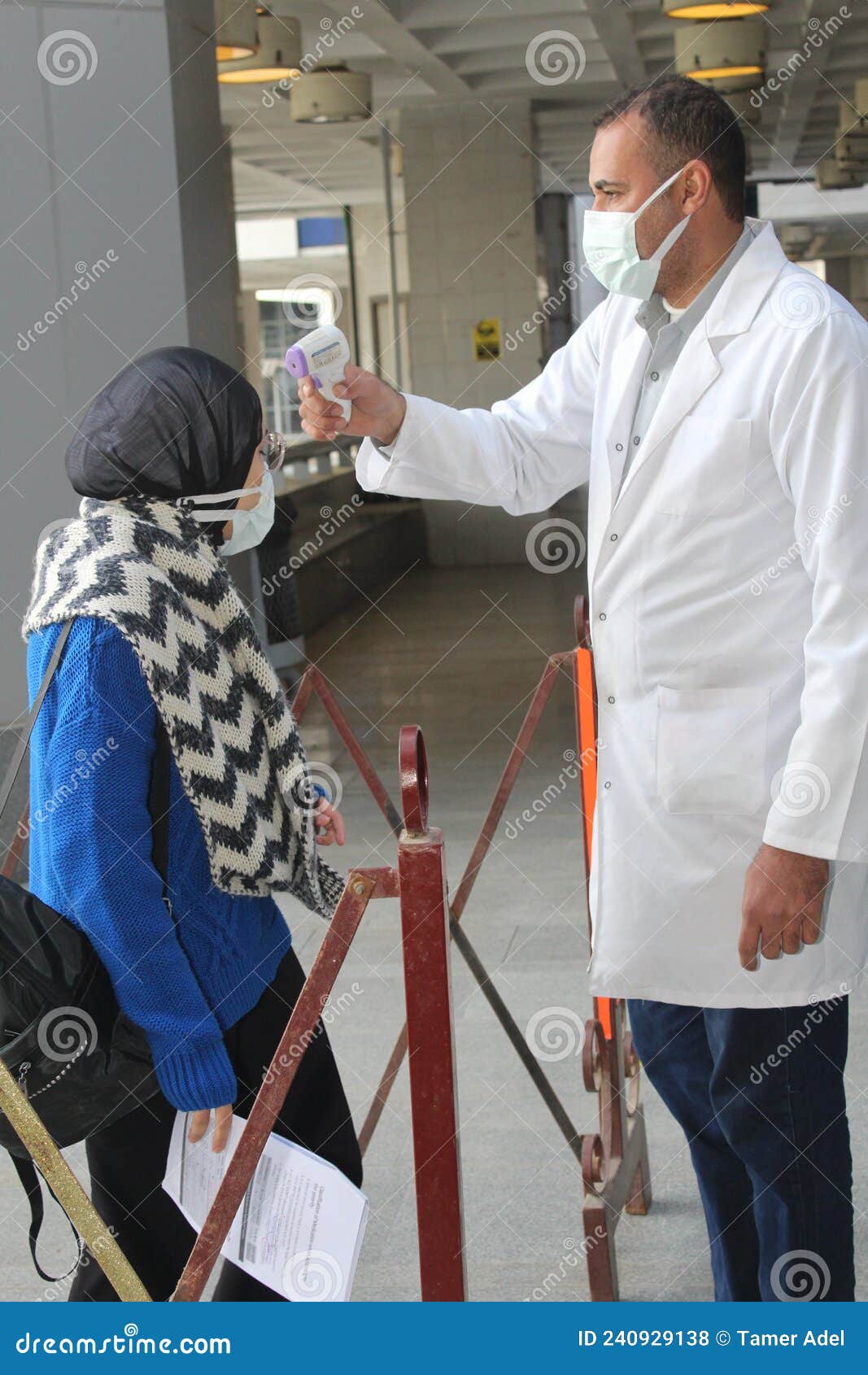 Strict Precautionary Measures before a Building Entry, Temperature ...