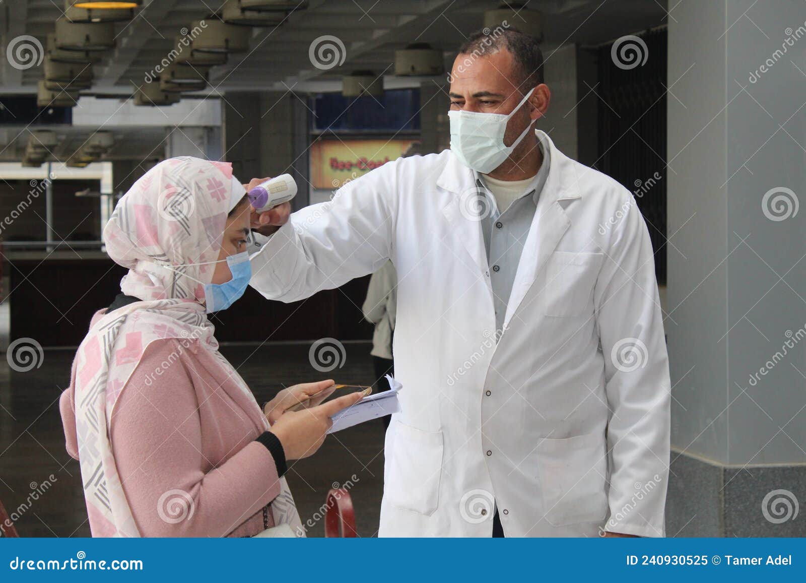 Strict Precautionary Measures before a Building Entry, Temperature ...