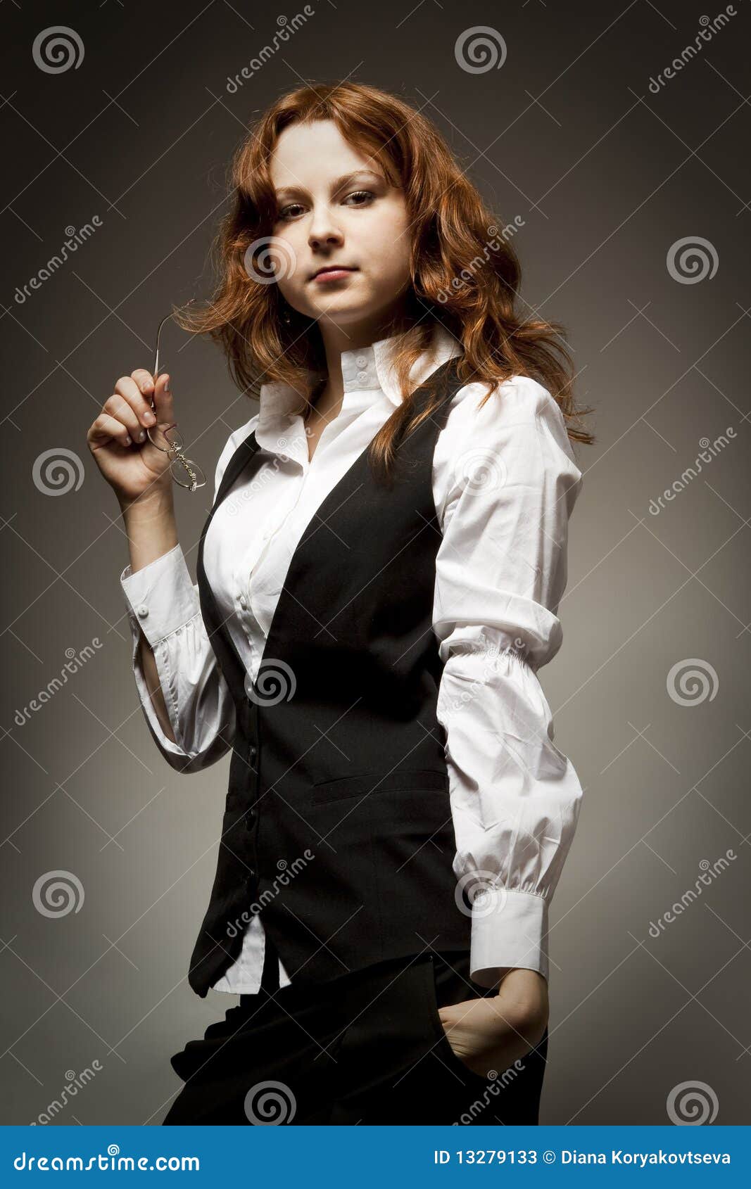 Strict redhead girl stock image. Image of shirt, office - 13279133
