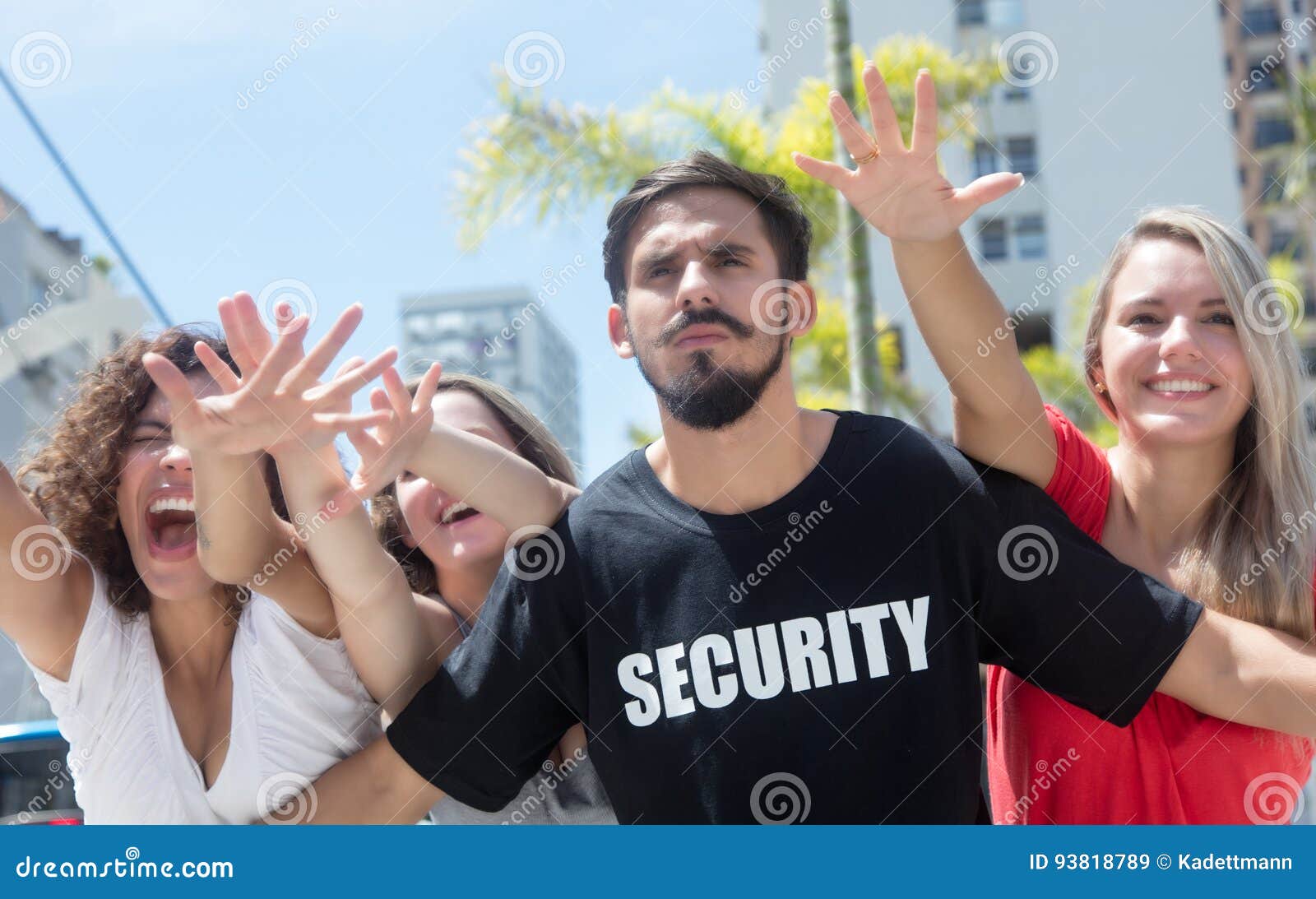 Strict Security Guard with Groupies at Concert Stock Image - Image of ...