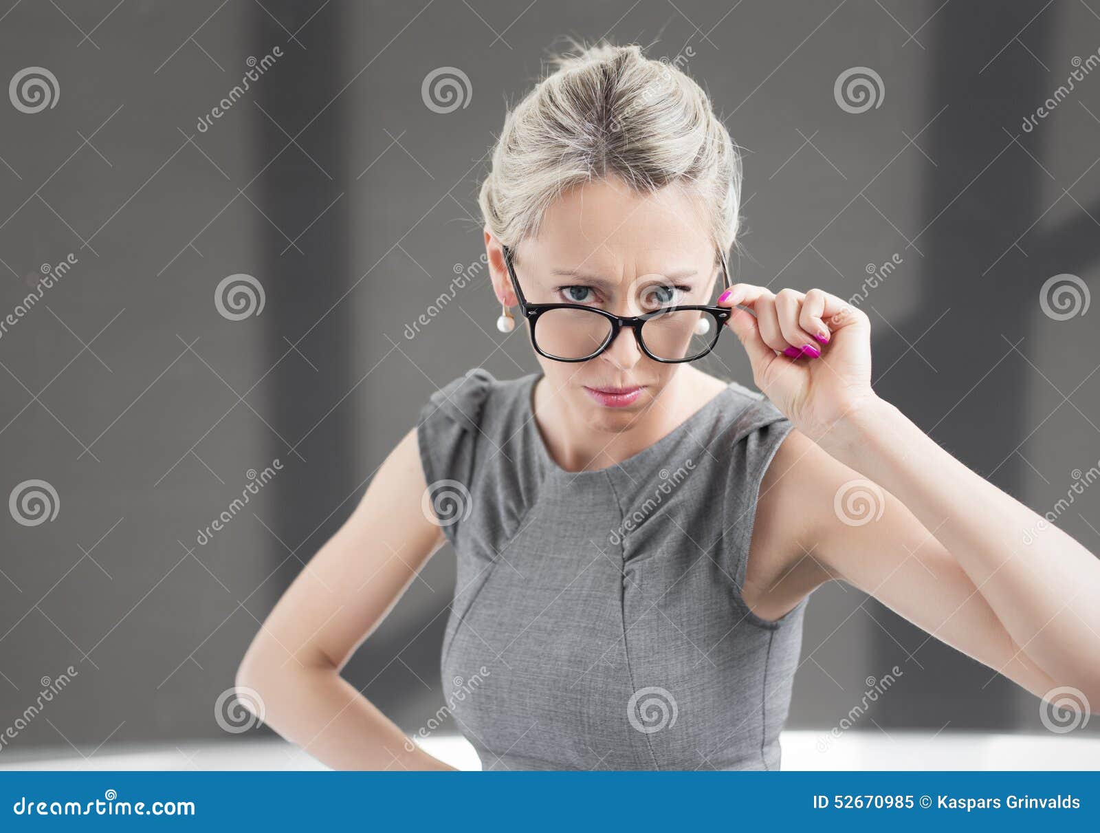 Strict Teacher In Glasses Giving Explanations While Holding Book. Tutor ...