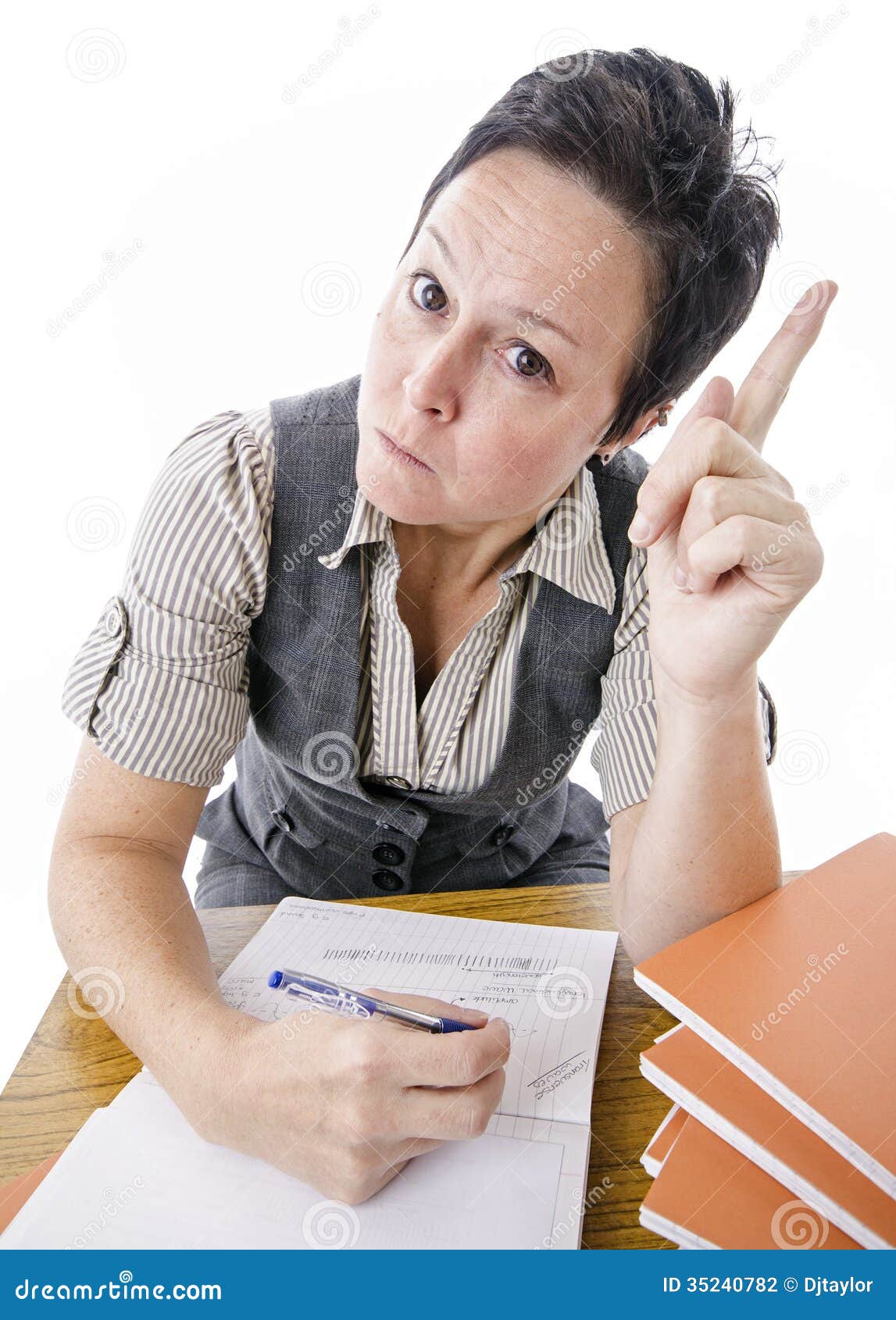 Strict Teacher Standing In Front Of Blackboard In Class Stock ...