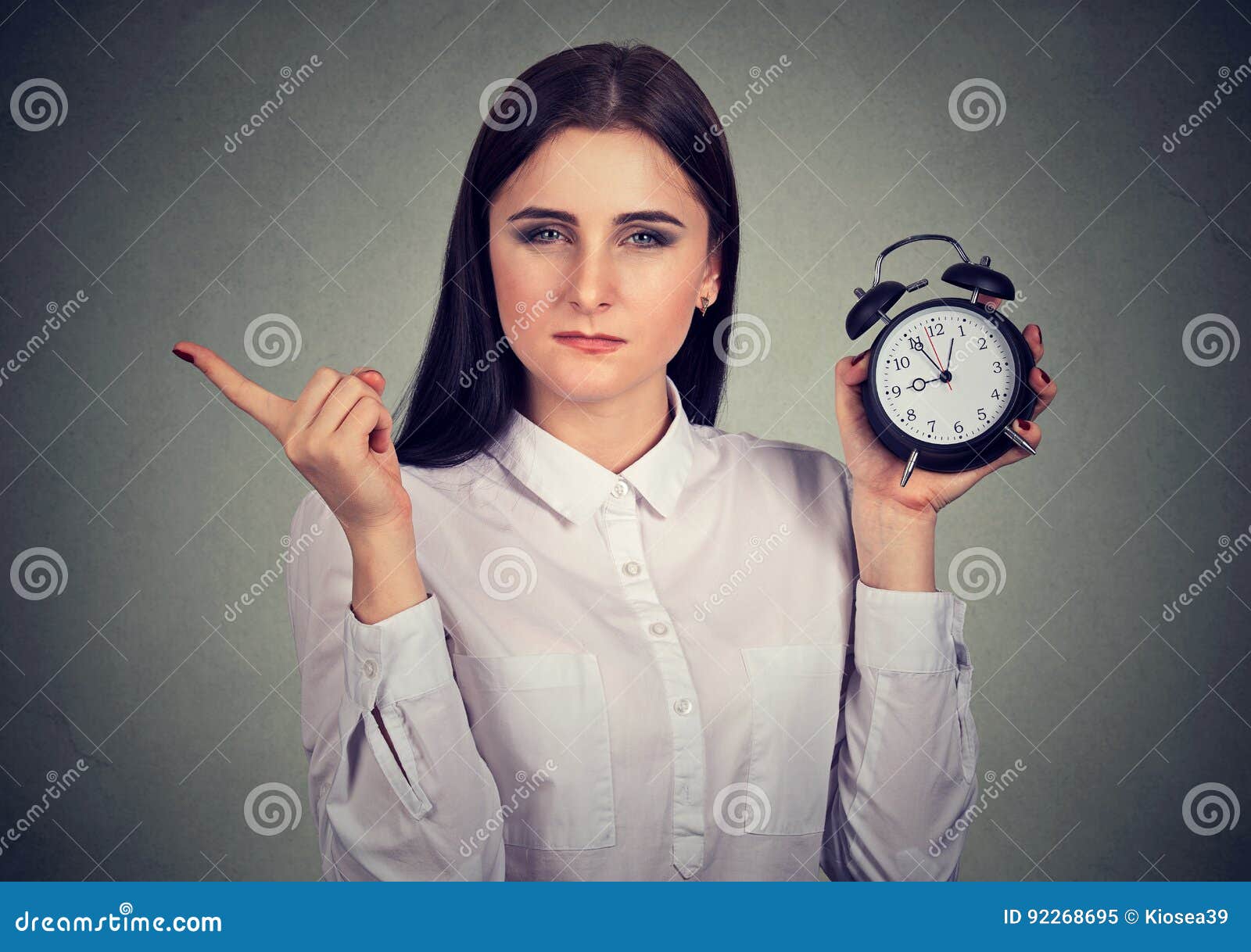 Strict Woman with Alarm Clock Stock Image - Image of angry, alarm: 92268695