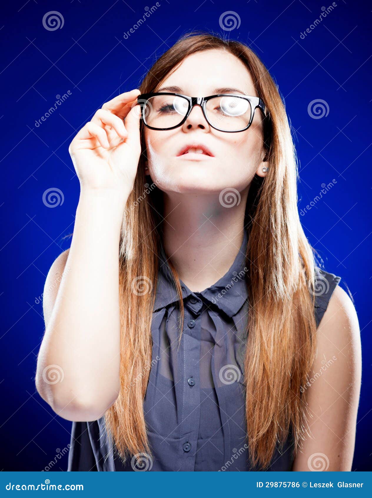Strict Young Woman Holding Nerd Glasses Stock Photo - Image of model ...
