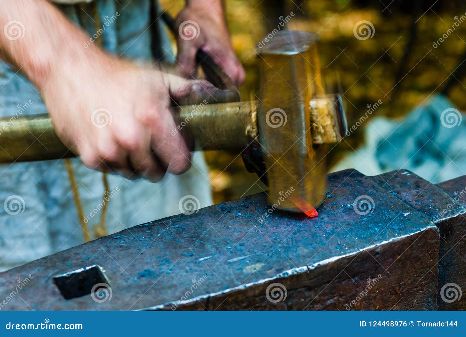 Strike the Iron while it is Hot Stock Photo - Image of ironsmith ...